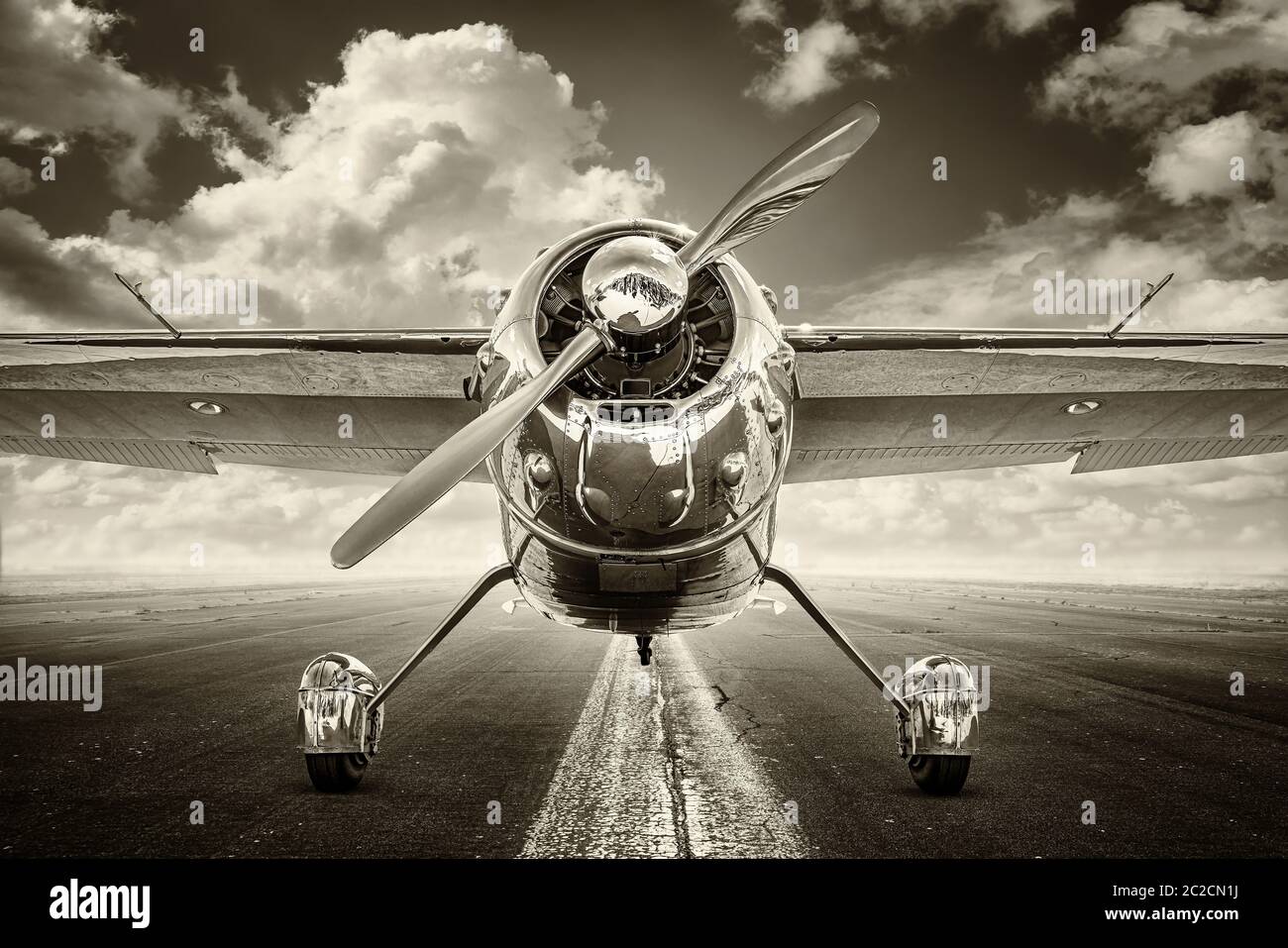 sports plane on a runway waiting for take off Stock Photo - Alamy