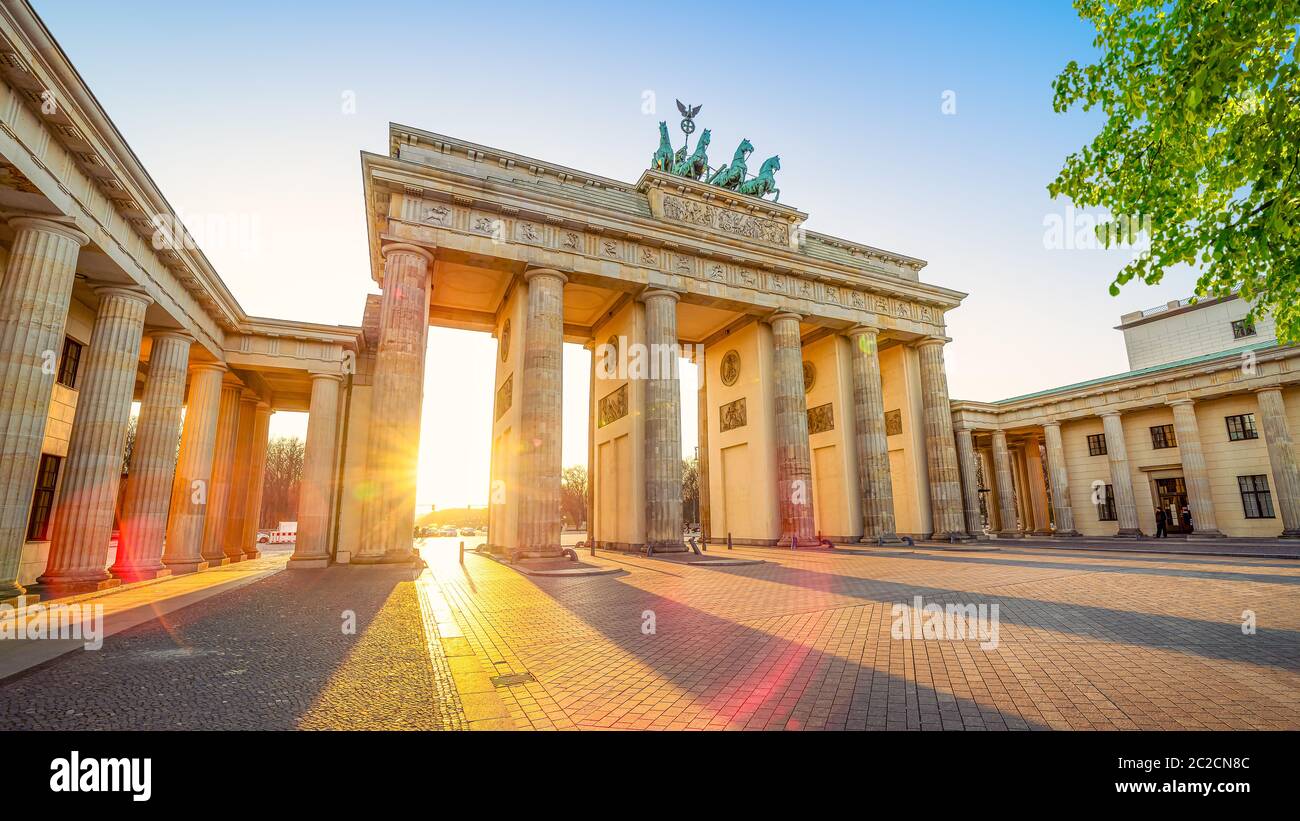 the famous brandenburg gate while sunset, berlin Stock Photo - Alamy