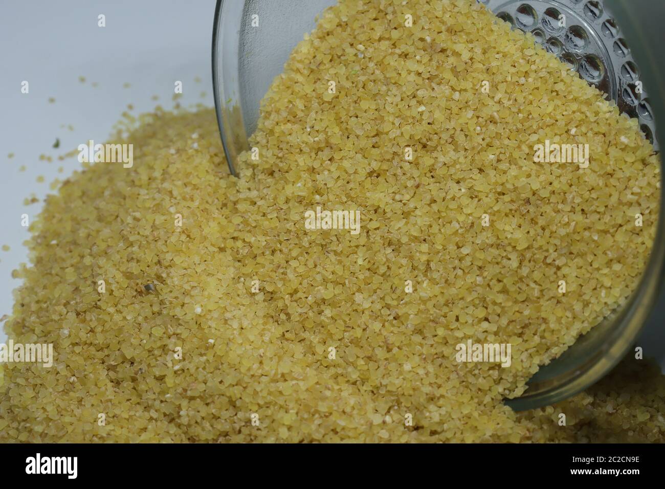 Raw Semolina flour or Rava powder isolated in white background Stock ...