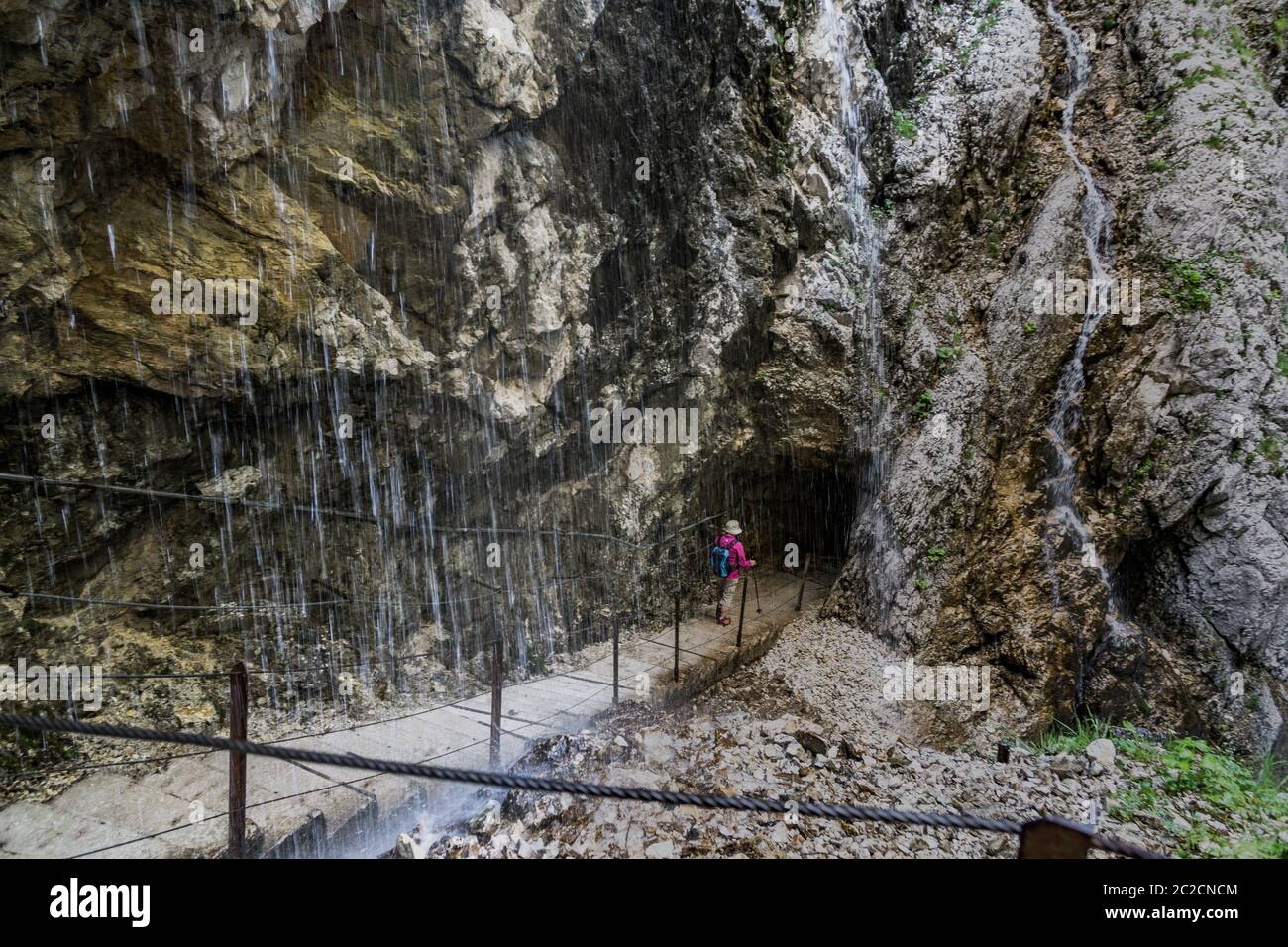 Woman hiking through rain hi-res stock photography and images - Alamy