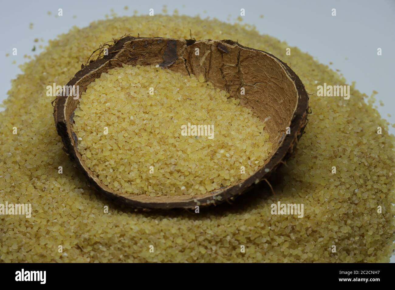 Raw Semolina flour or Rava powder isolated in white background Stock ...