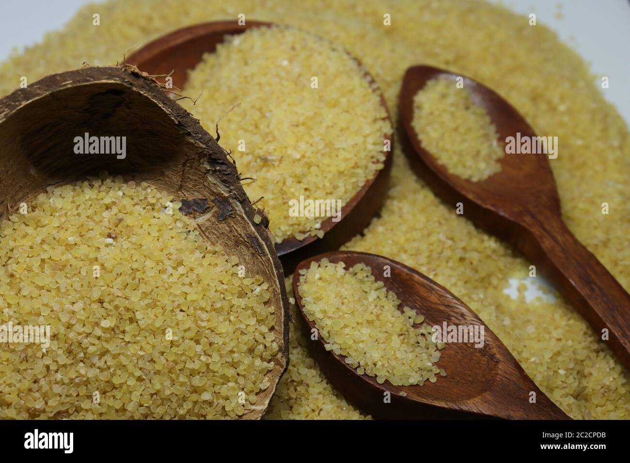 Raw Semolina flour or Rava powder isolated in white background Stock ...