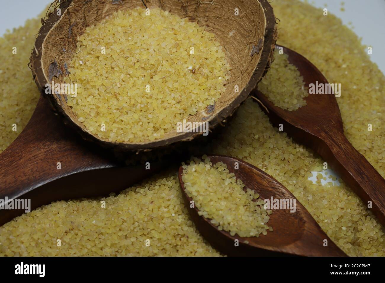 Raw Semolina flour or Rava powder isolated in white background Stock ...