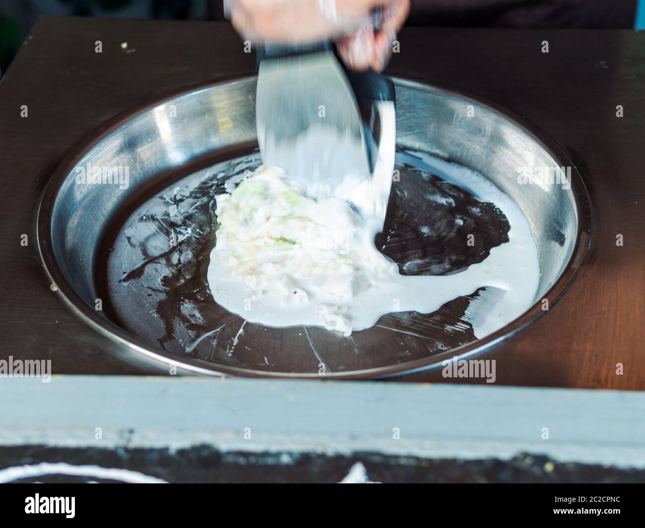 Making rolled ice cream hi-res stock photography and images - Alamy