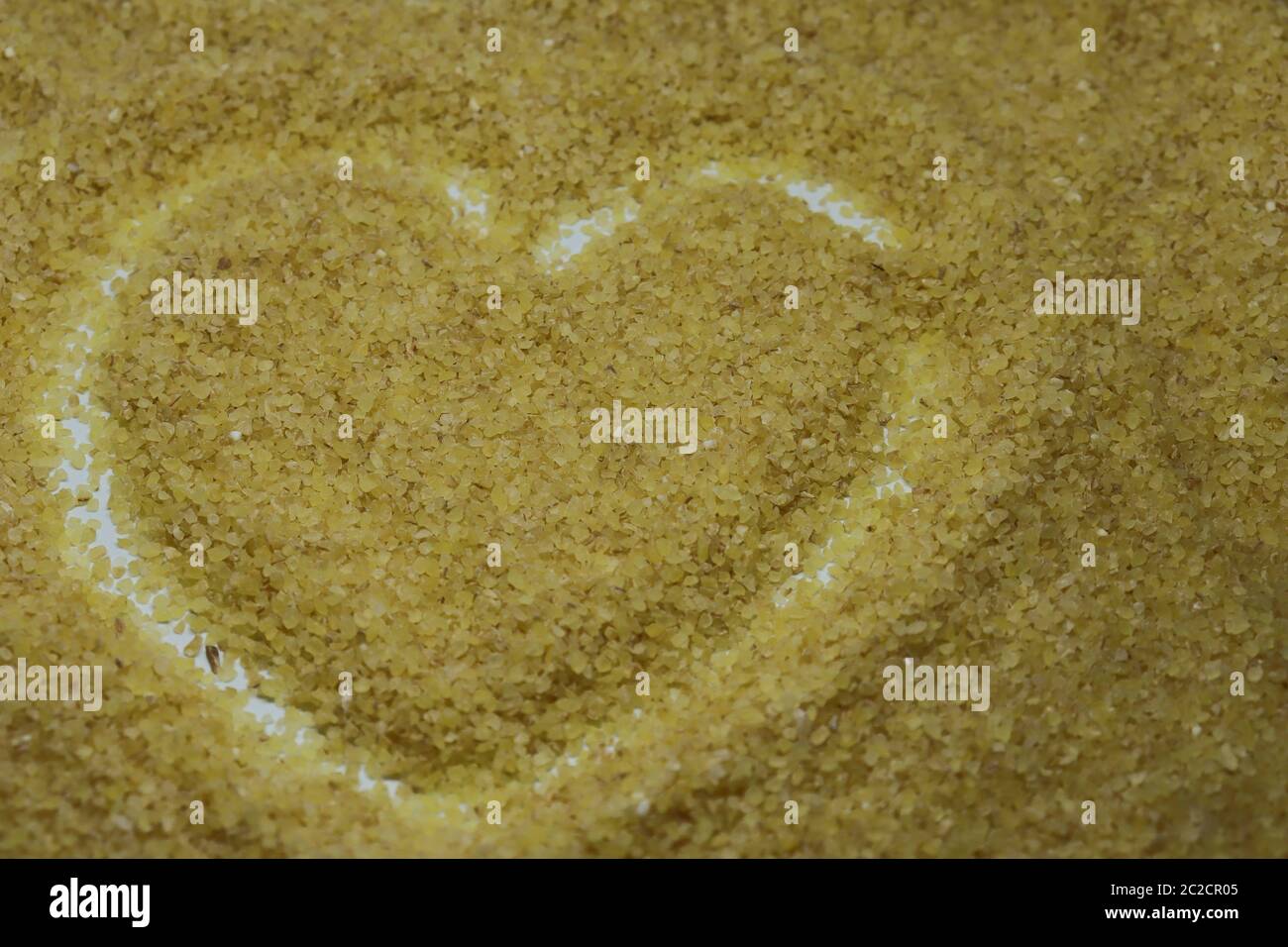Raw Semolina flour or Rava powder isolated in white background Stock ...