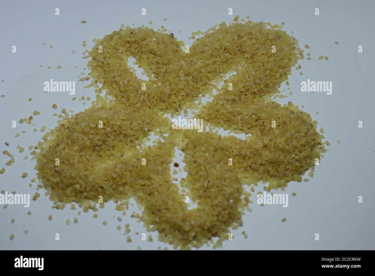 Raw Semolina flour or Rava powder isolated in white background Stock ...