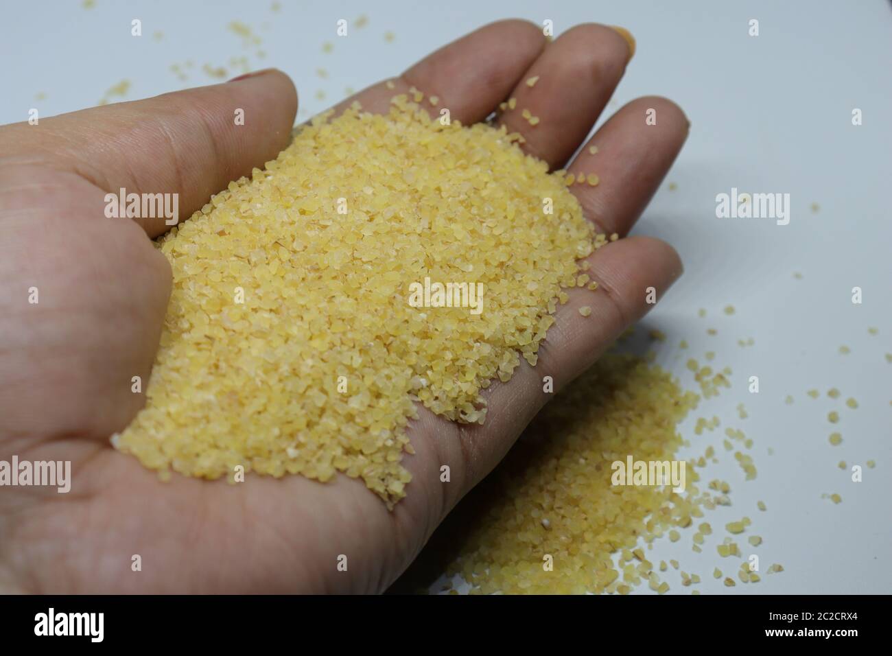 Raw Semolina flour or Rava powder isolated in white background Stock ...