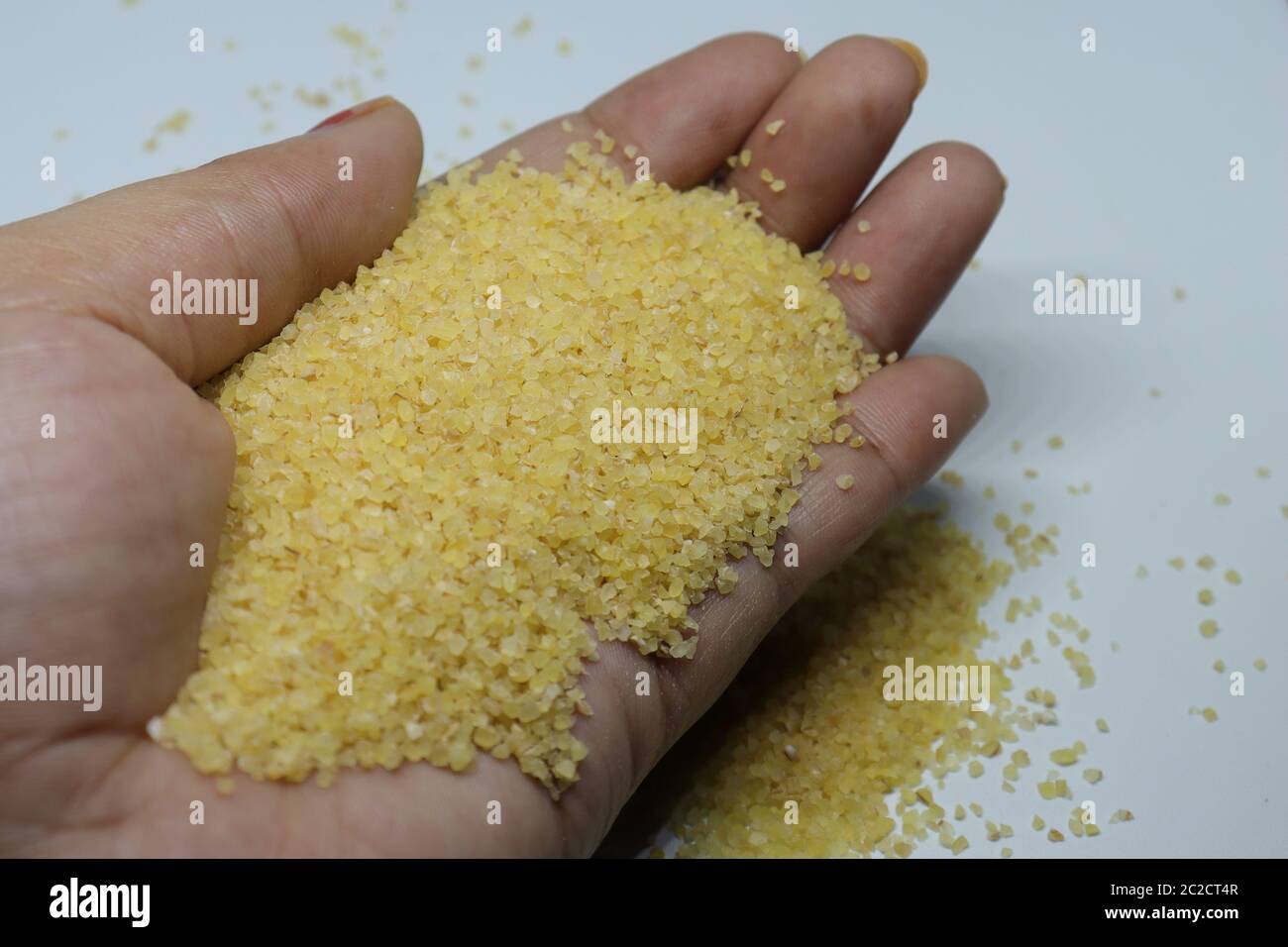 Raw Semolina flour or Rava powder isolated in white background Stock ...