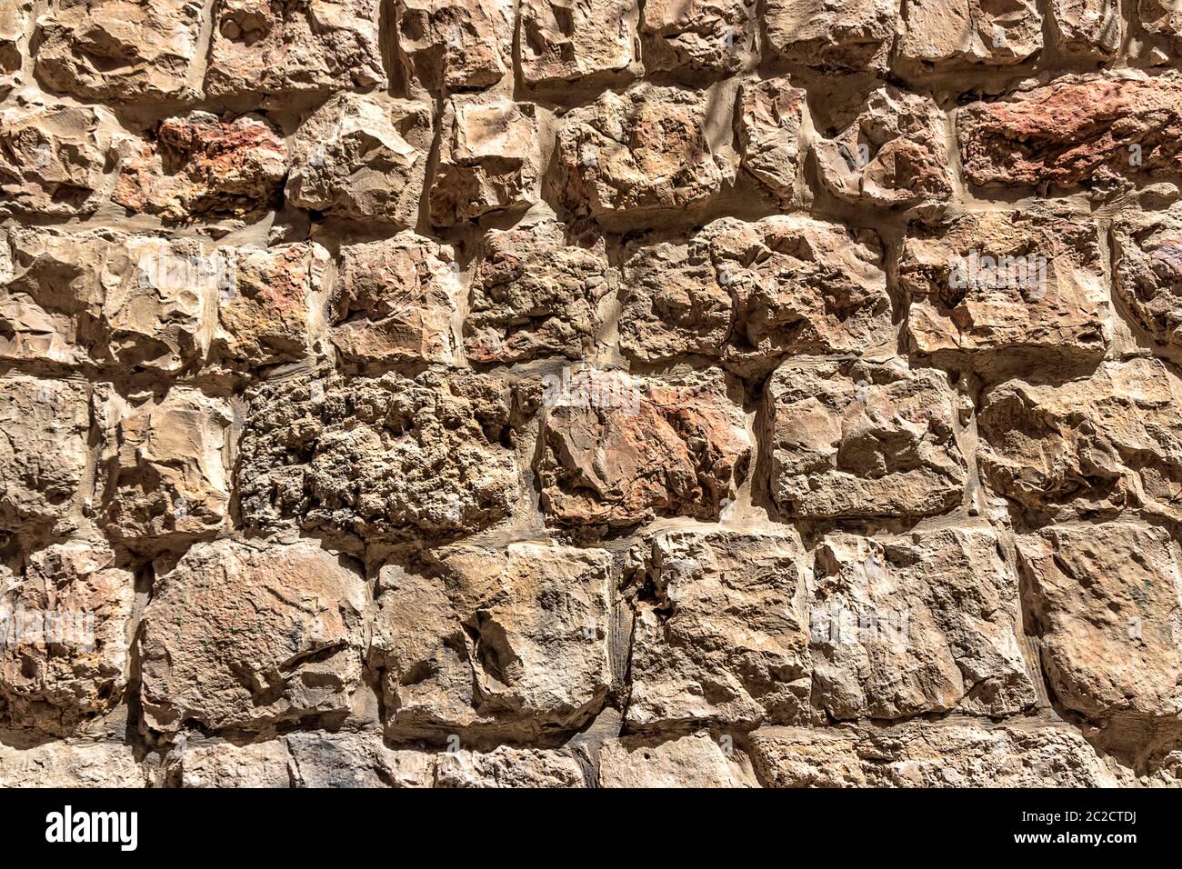 View of surface of the stone wall of the masonry of Jerusalem stones ...