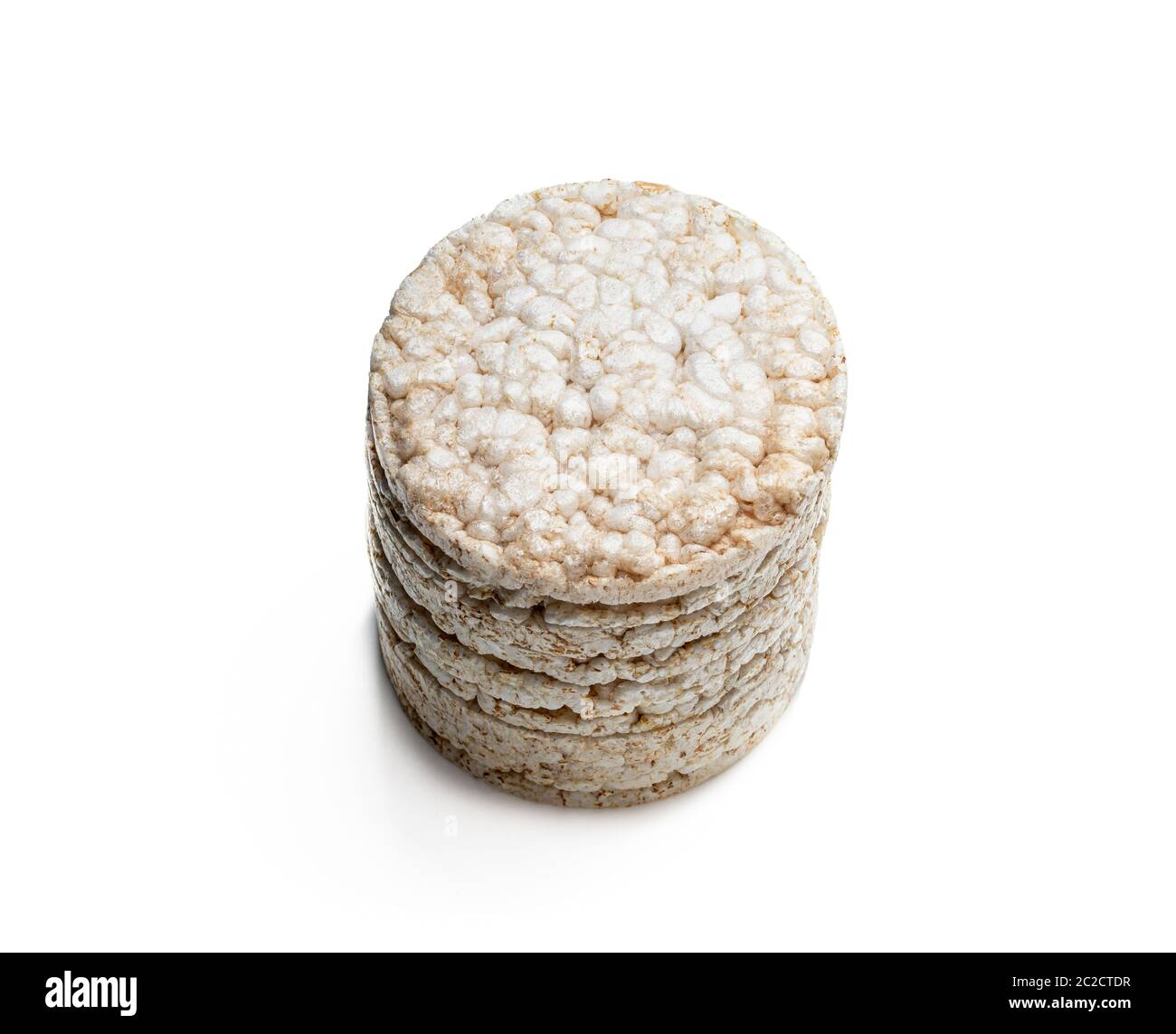 Stack of rice crackers isolated on white Stock Photo - Alamy