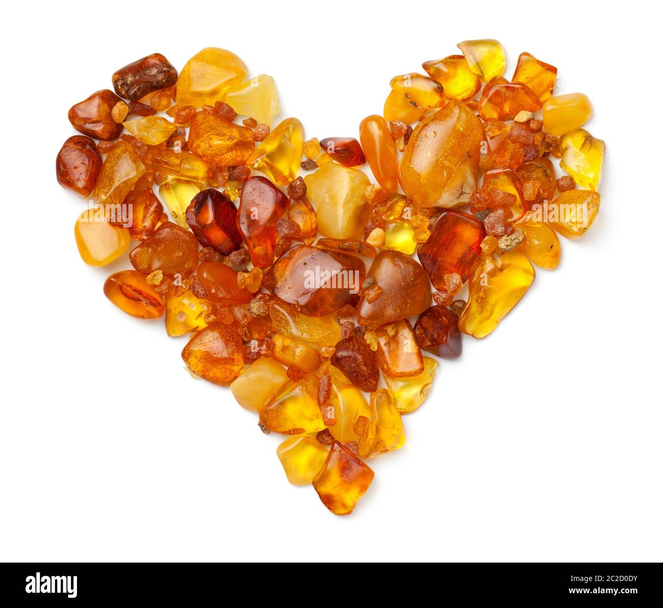 Heart made of ambers isolated on white background. Polished ambers. Top ...