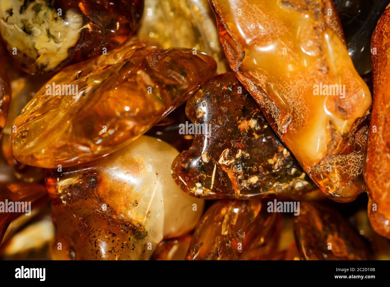 Amber stone. Authentic Baltic amber can have prehistoric fossil insect ...