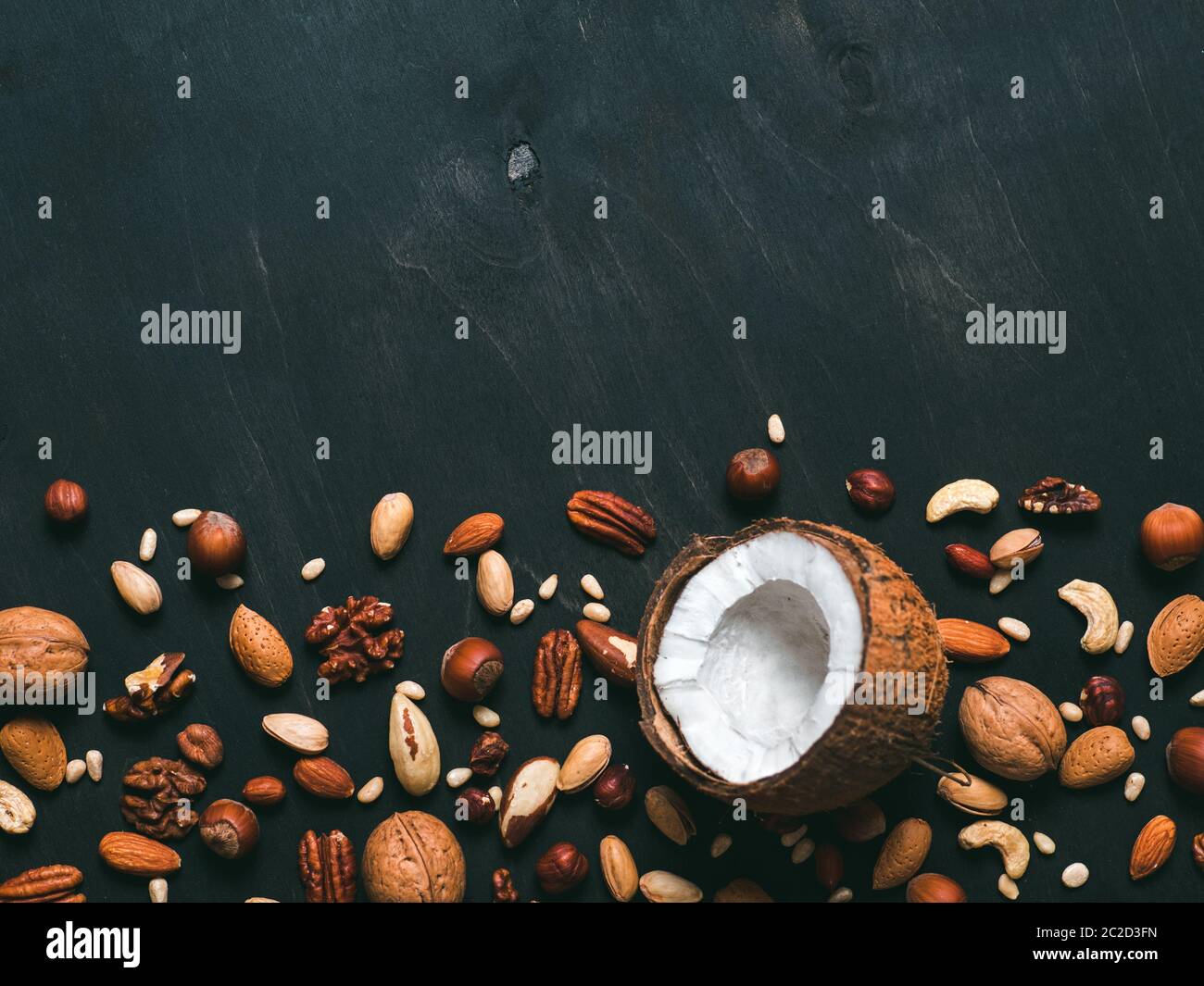 Handful of mixed nuts hi-res stock photography and images - Alamy