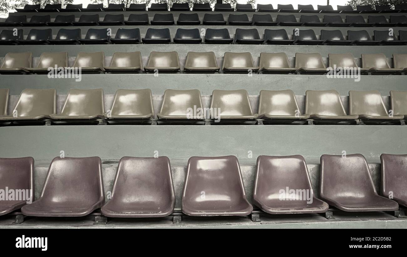 seats stand line plastic row chair seating vintage Stock Photo - Alamy