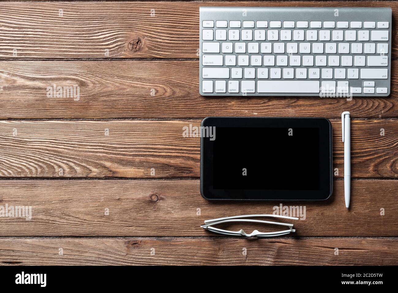 Top view of office workspace with gadgets Stock Photo - Alamy