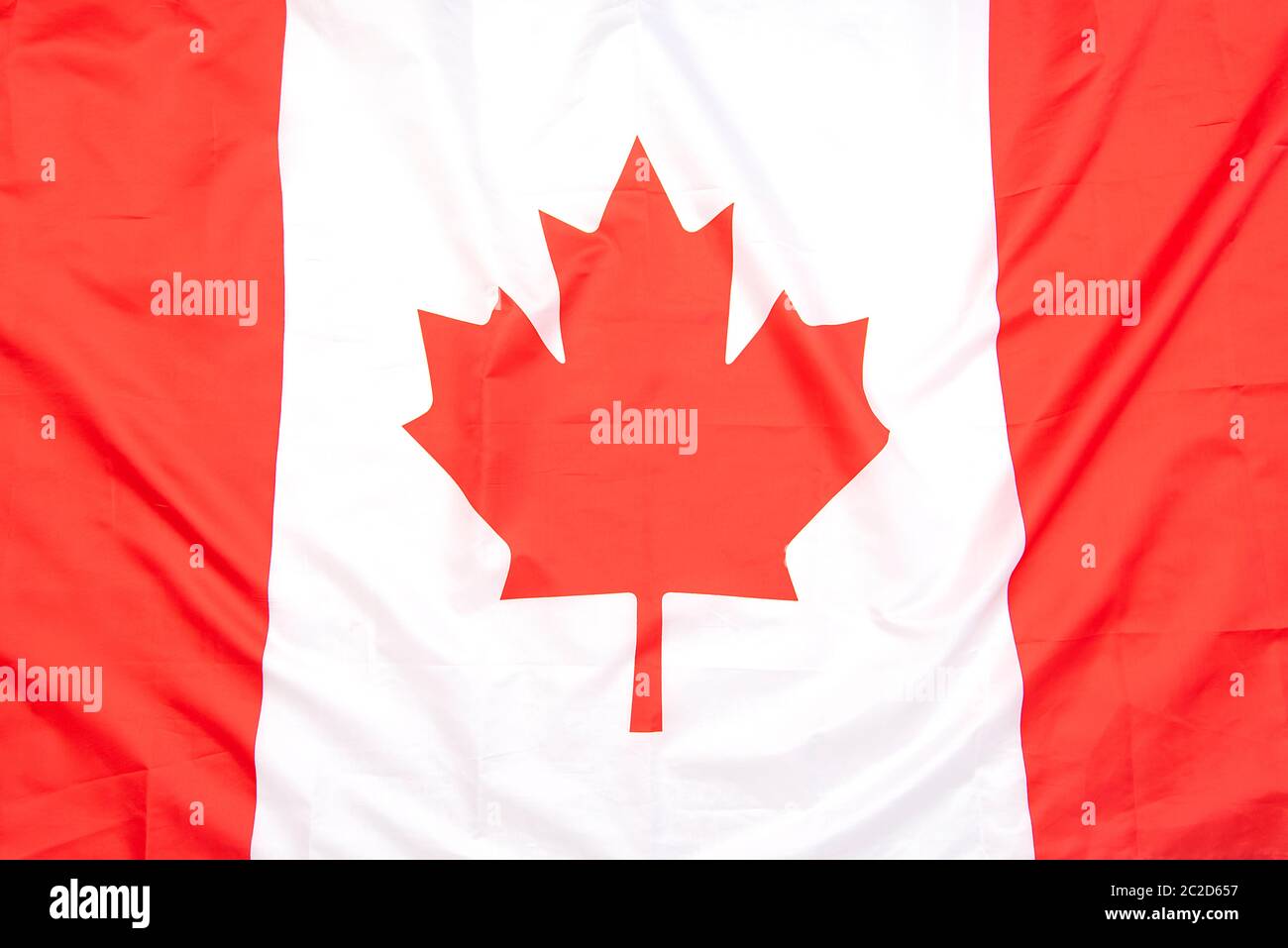 Real fabric flag of Canada as background or texture, top view, Canadian ...