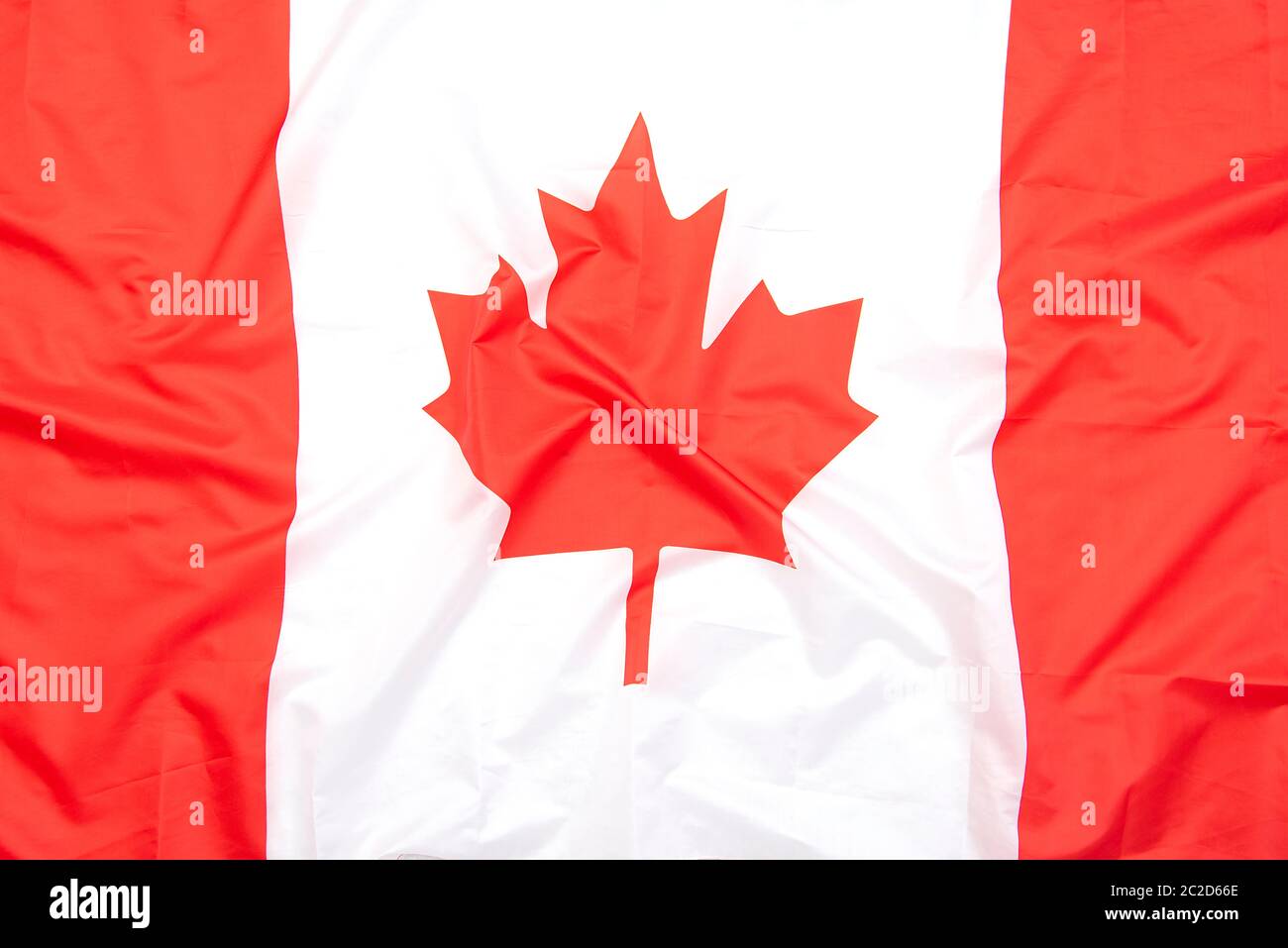 Real fabric flag of Canada as background or texture, top view, Canadian ...