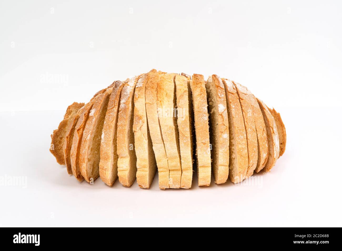 a loaf of bread cut into slices Stock Photo - Alamy