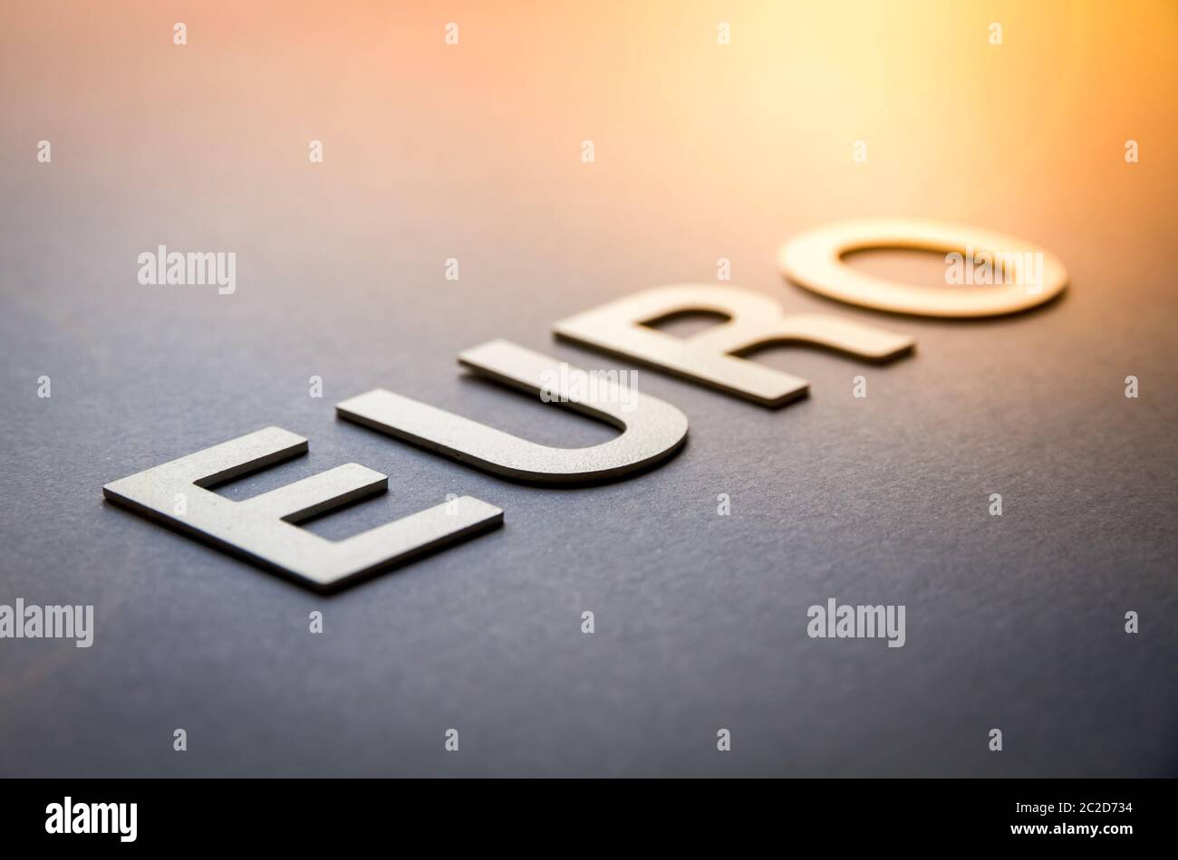 Word euro written with white solid letters on a board Stock Photo - Alamy