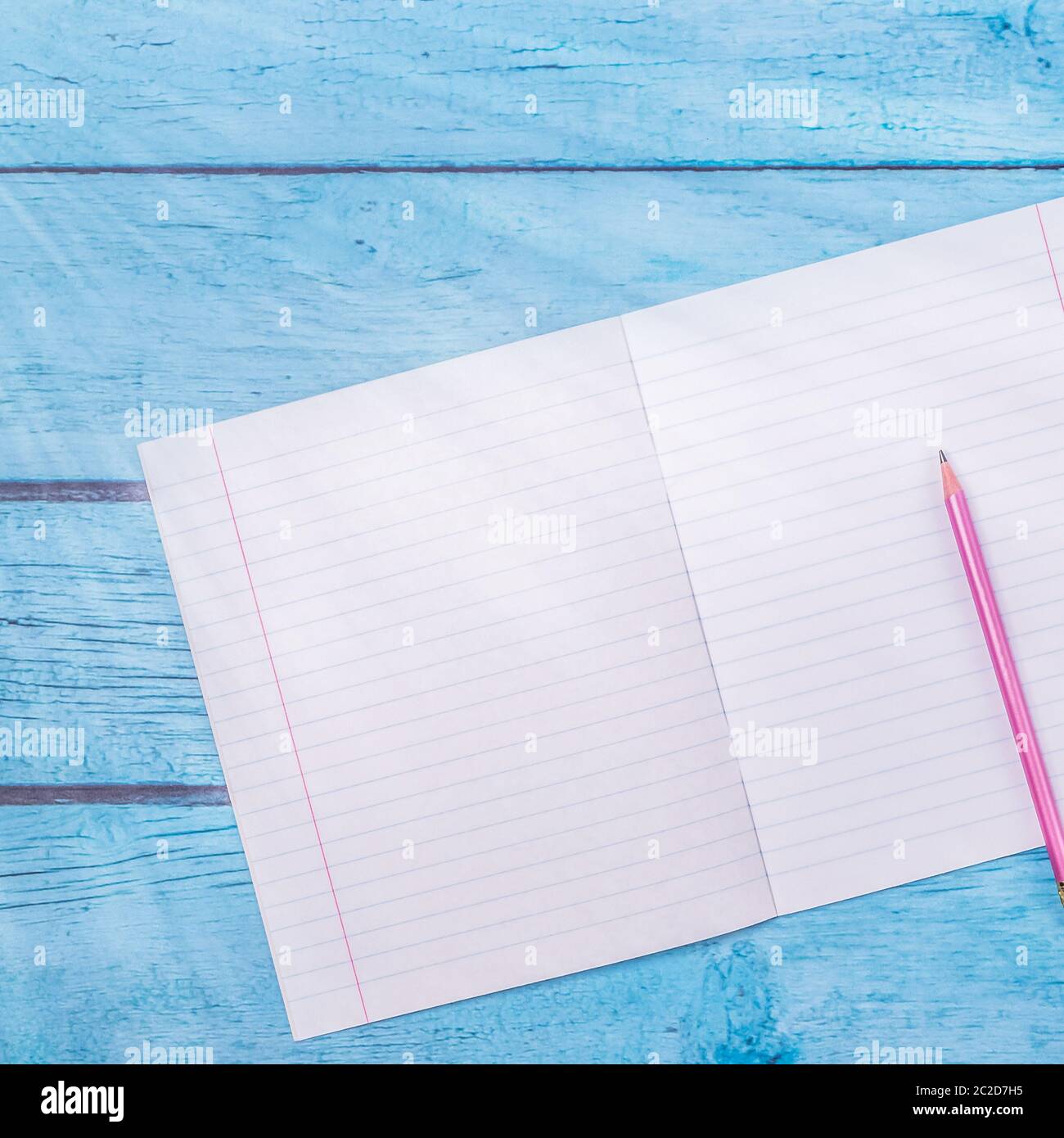 Notepad with pencil on wood board background.using wallpaper for ...