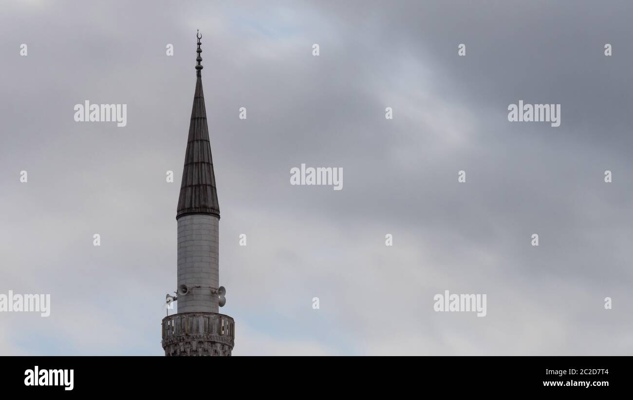 minaret with dark clouds in Turkey Stock Photo - Alamy
