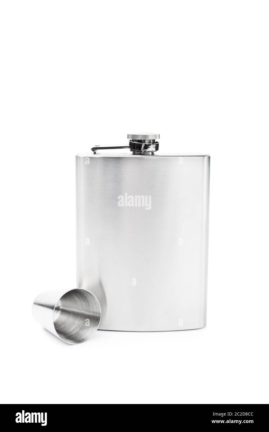 Stainless steel flask with a small metal cup, isolated on white ...