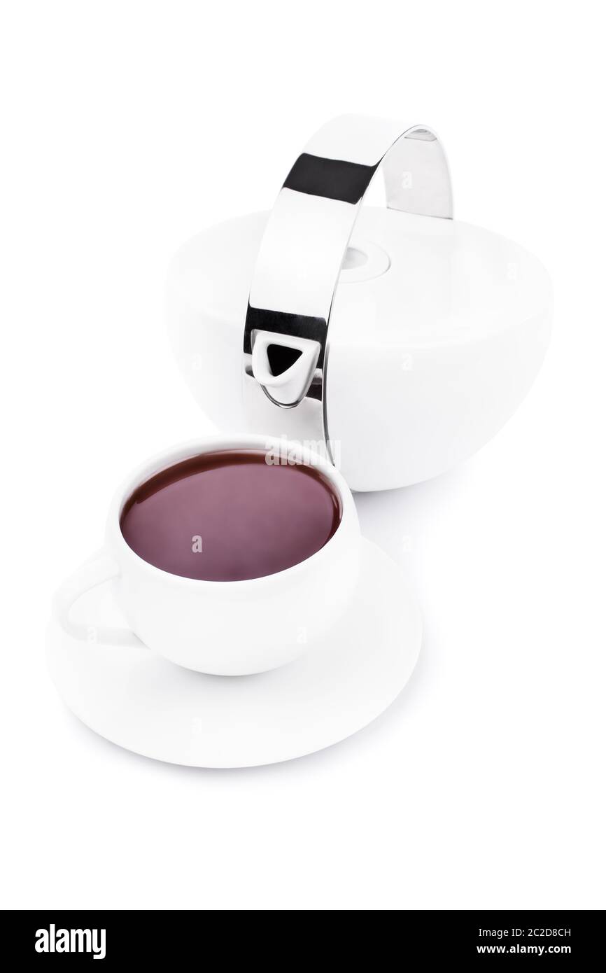 Tea cup filled with red colored tea and tea pot, isolated on white ...