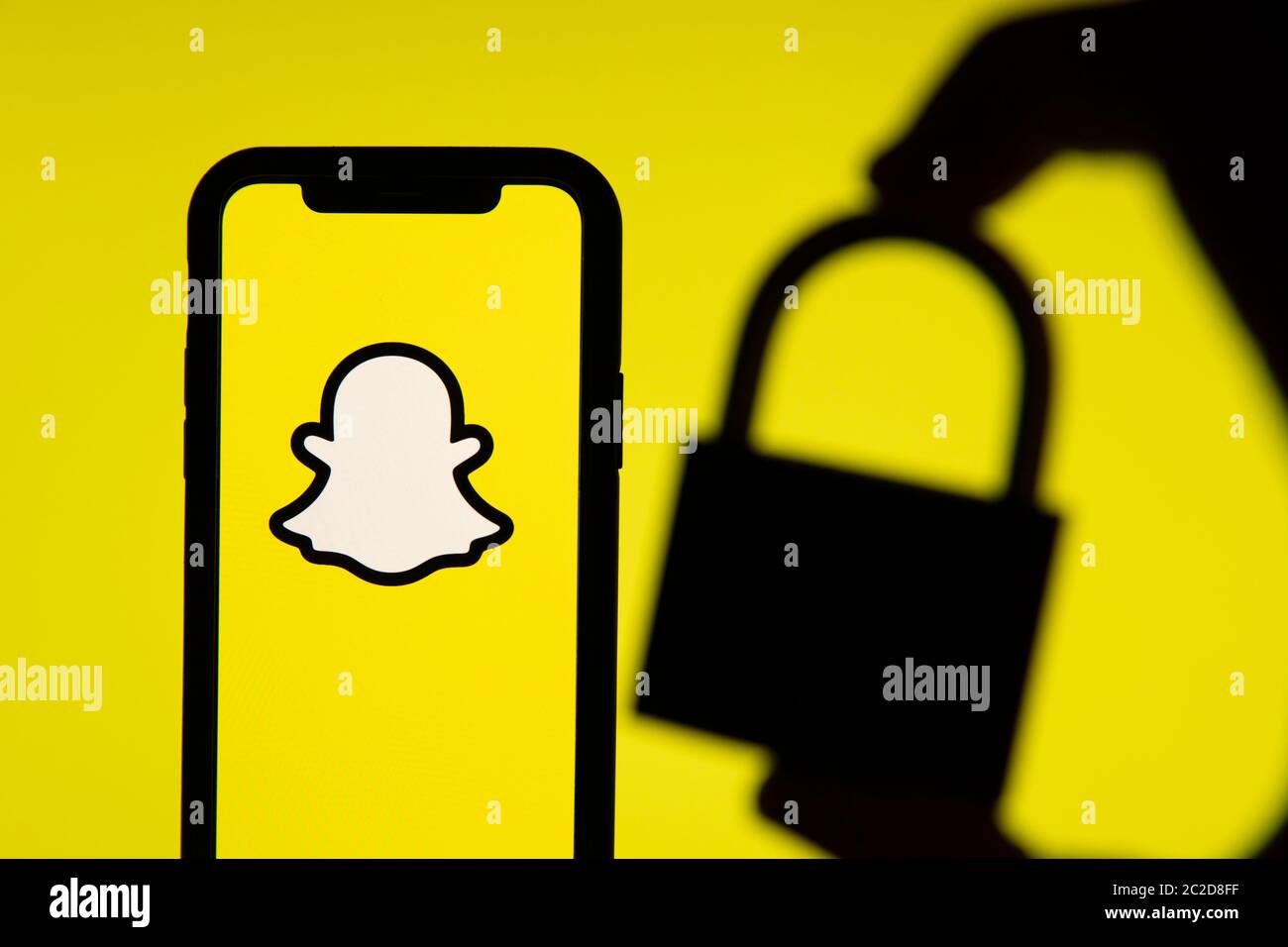 LONDON, UK - JUNE 2020: Snapchat social media logo ith a security ...