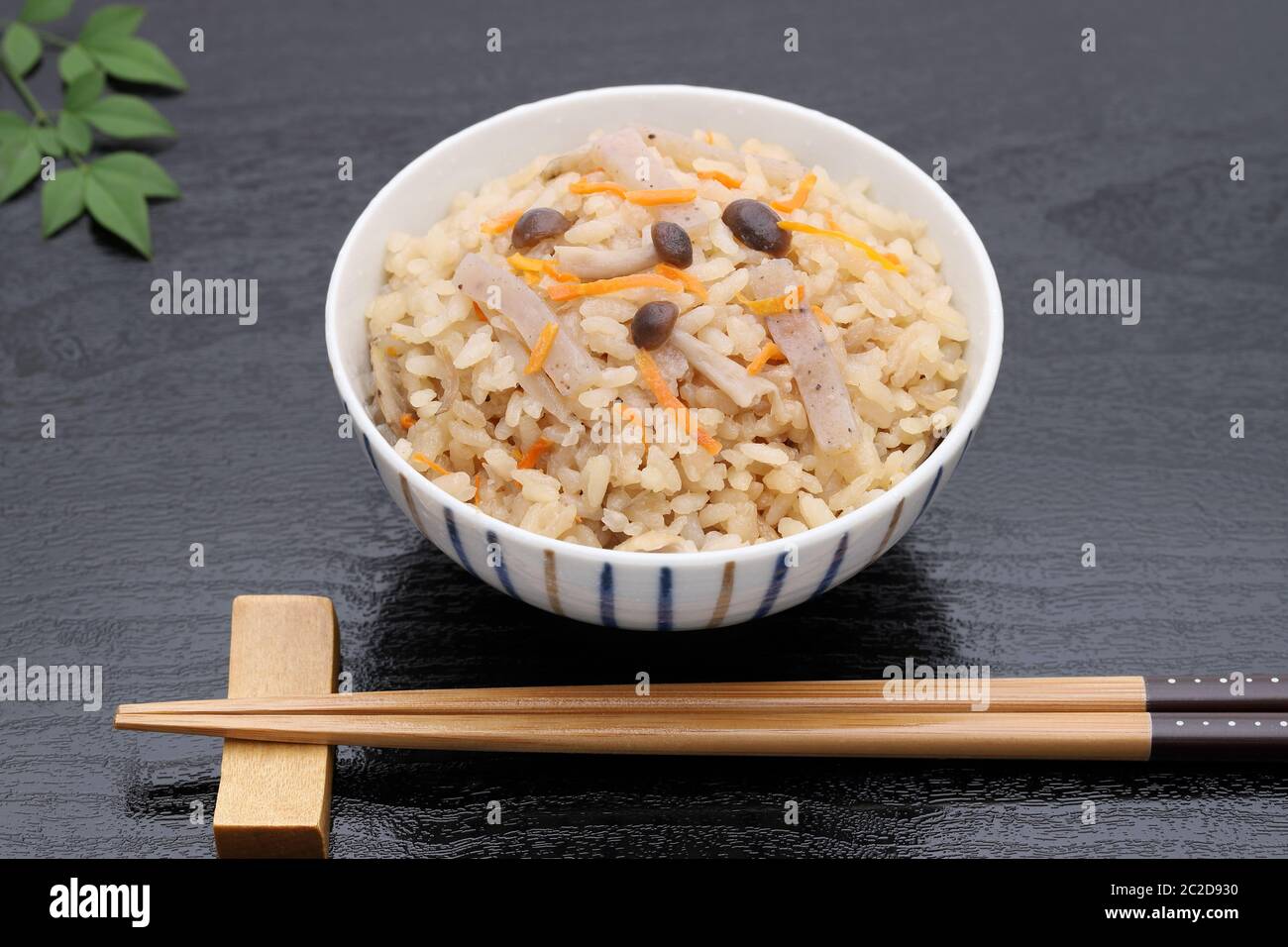 Japanese food, Takikomi gohan boiled rice on black table Stock Photo ...