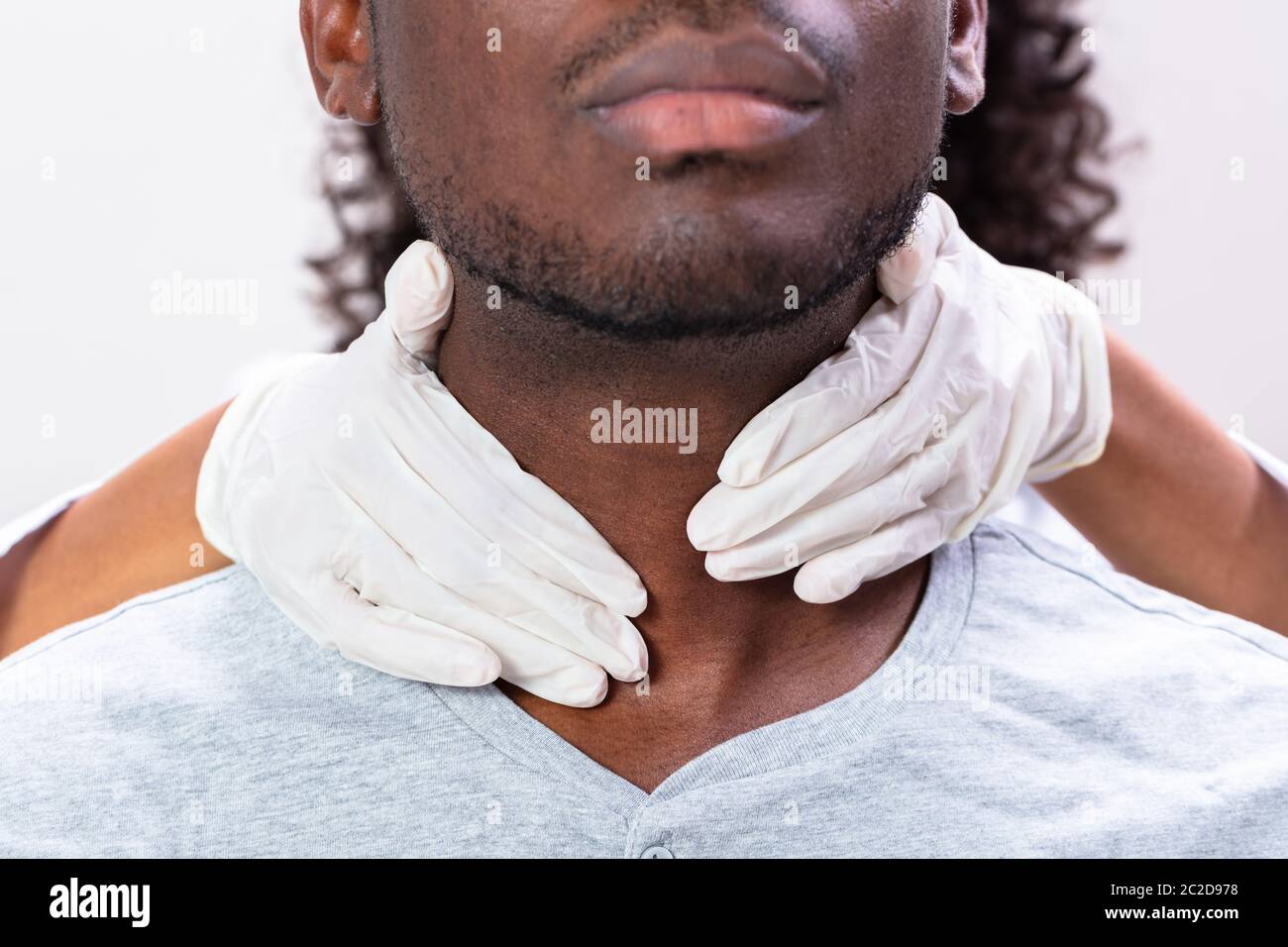 Doctor Performing Physical Exam Palpation Of The Thyroid Gland Stock ...