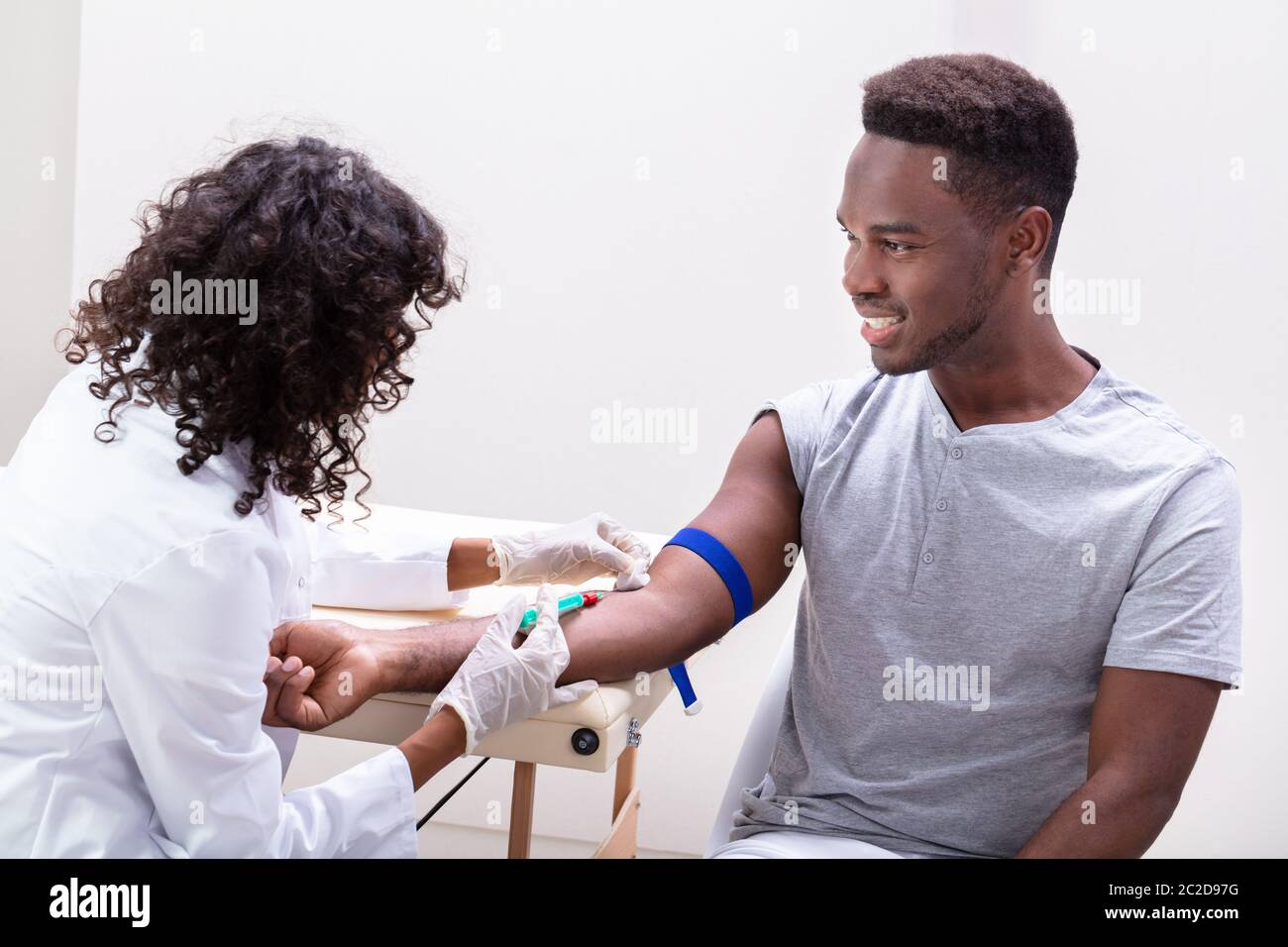 Blood draw african hi-res stock photography and images - Alamy