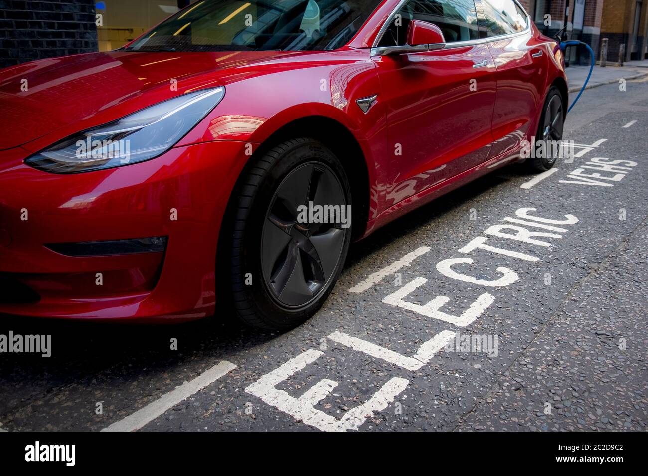Tesla model 3 red hi-res stock photography and images - Alamy