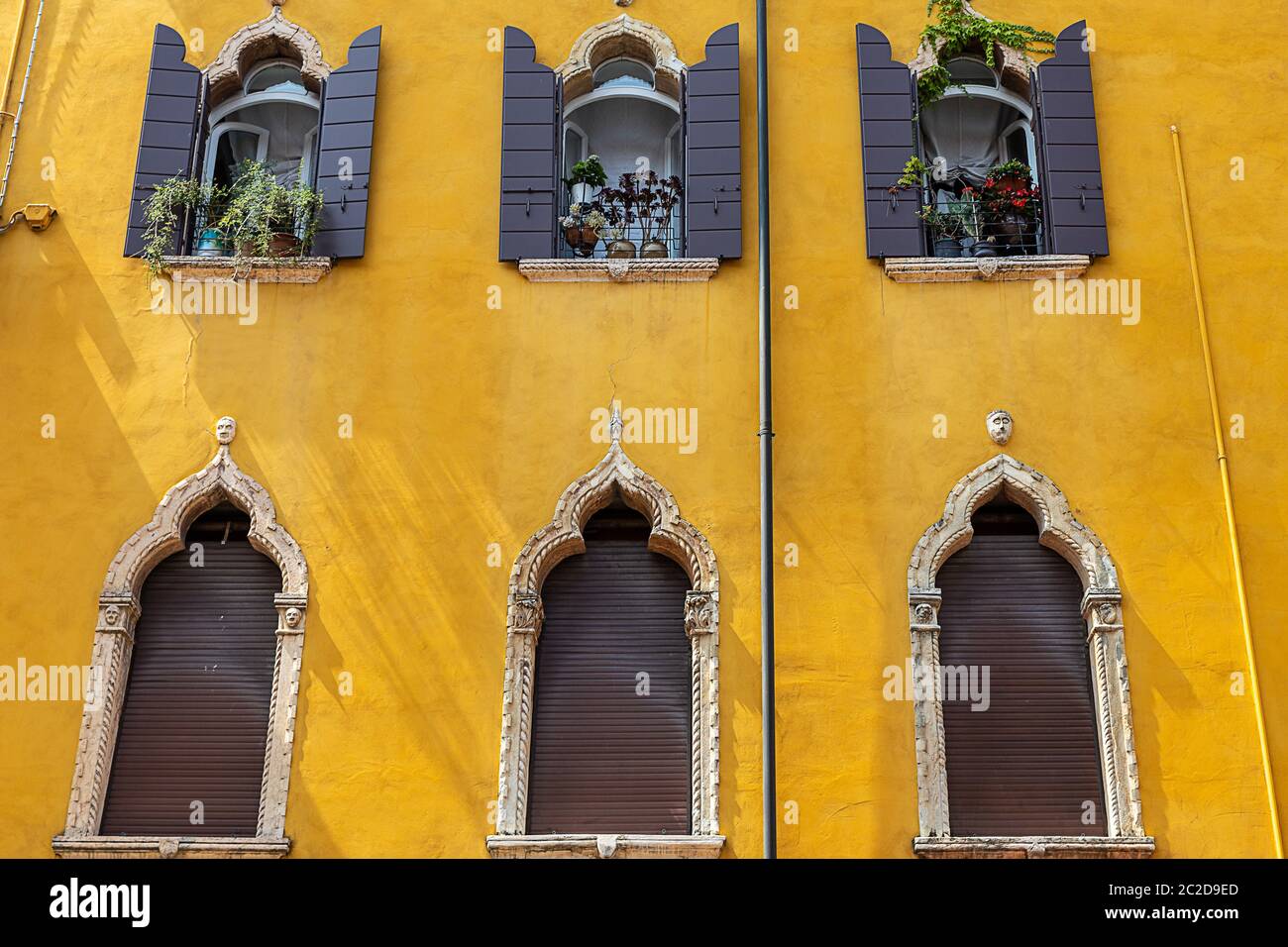 windows in the facades of ancient Venetian houses Stock Photo - Alamy