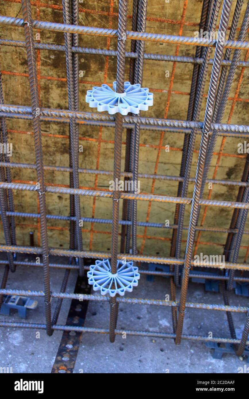 Spacer for structural steel, used to concreting a wall Stock Photo - Alamy