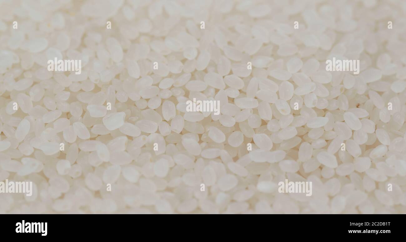 Pile of Rice dried and uncooked Stock Photo - Alamy