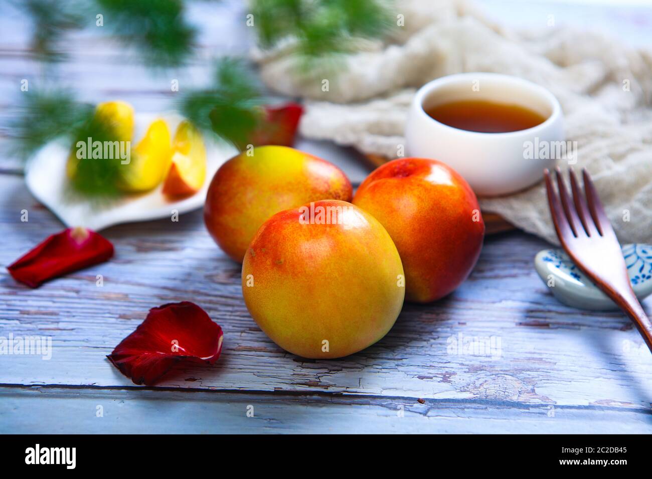Yellow peach drink nutrition afternoon tea Stock Photo - Alamy