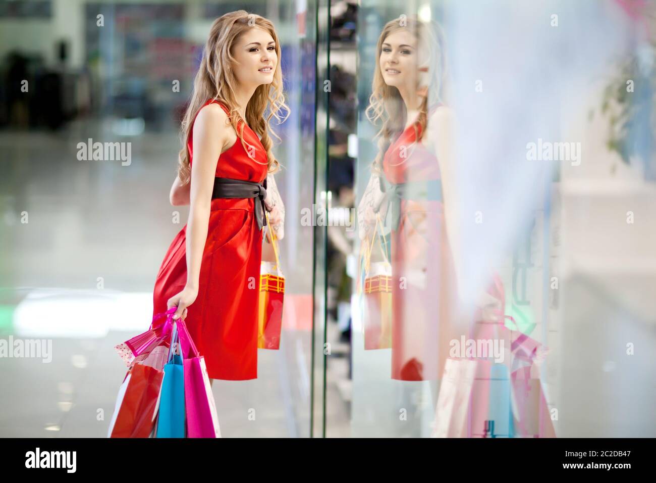 A woman is shopping in a store Stock Photo - Alamy