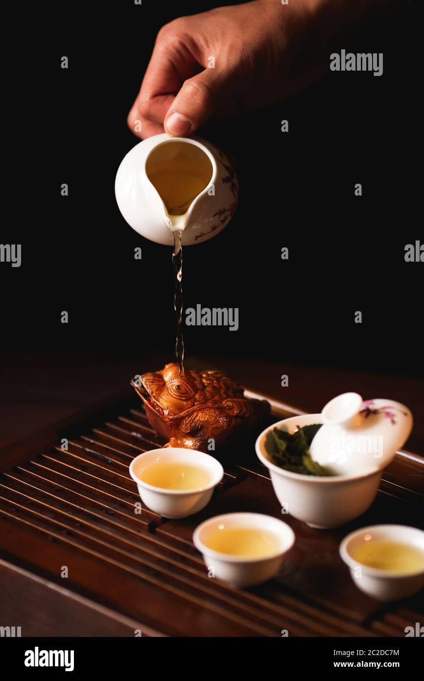 The Traditional Chinese tea ceremony is perfomed by tea master Stock ...