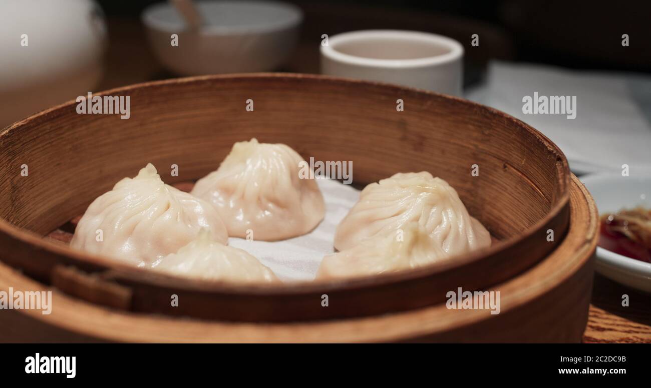 Steamed meat dumpling in restaurant Stock Photo - Alamy