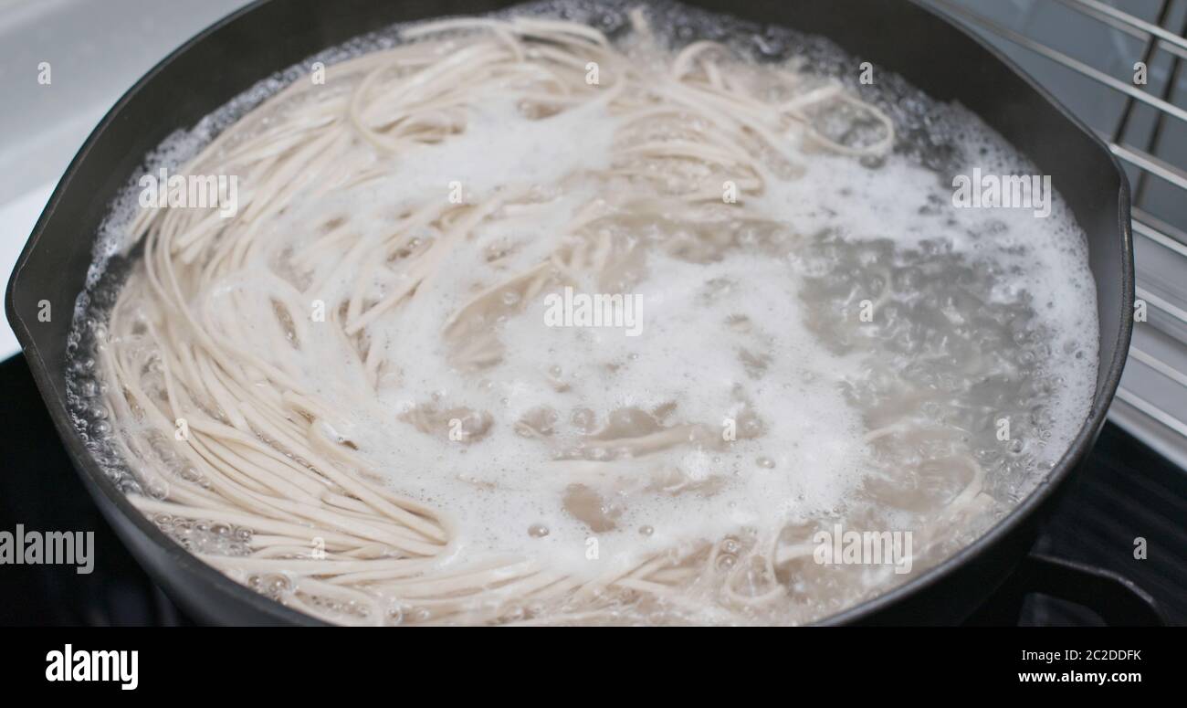 Cooking Japanese soba at skillet pan Stock Photo - Alamy