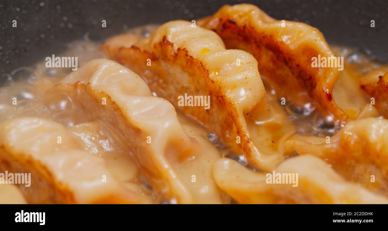 Fry japanese meat dumpling in hi-res stock photography and images - Alamy