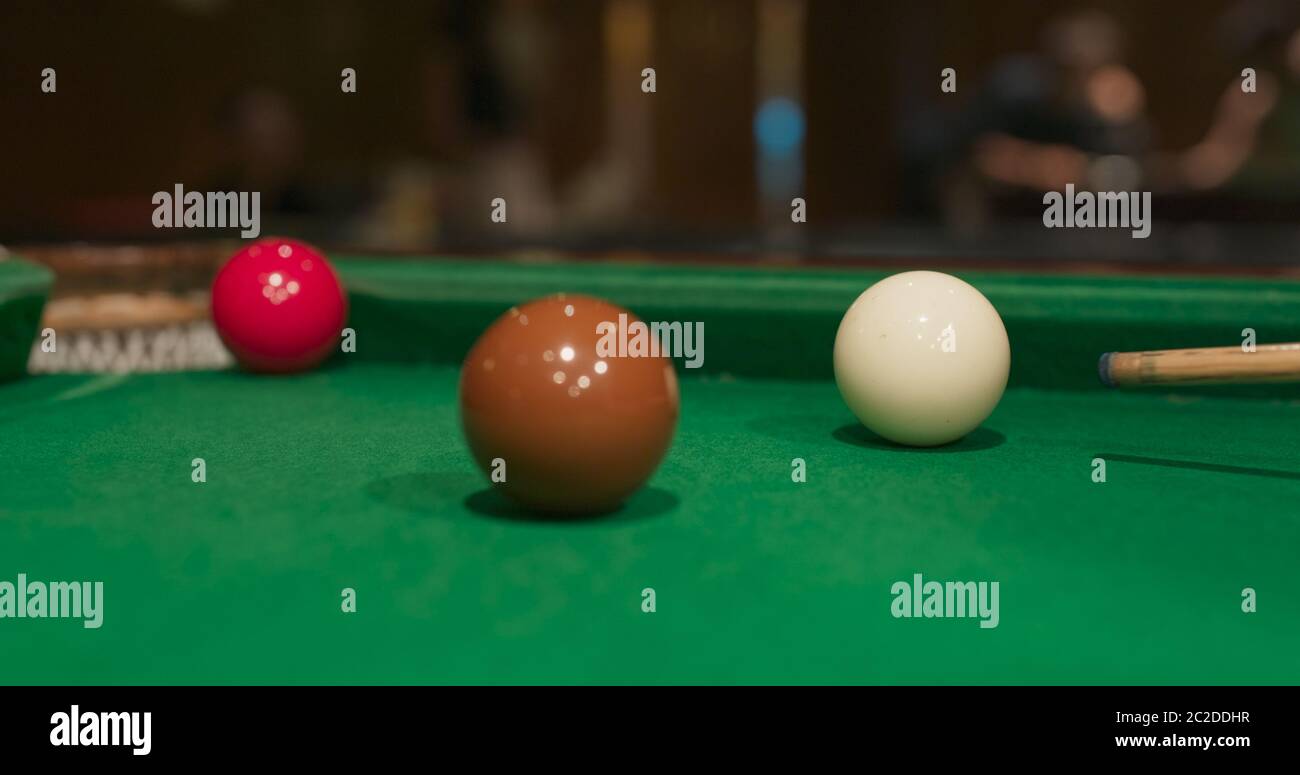 Snooker shooting on snooker table Stock Photo - Alamy