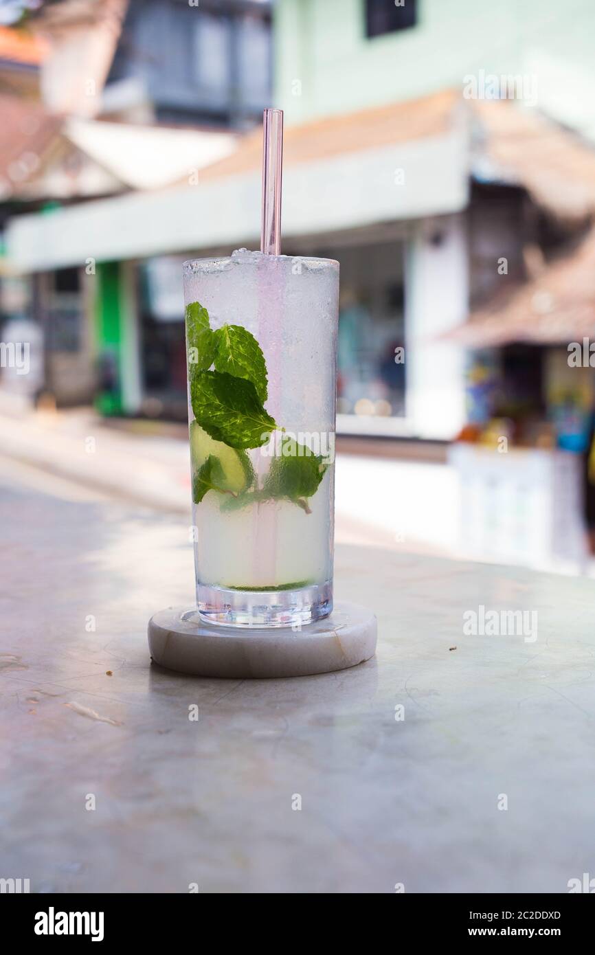 Exotic Cocktails on the bar at a vacation location, colorful drinking ...