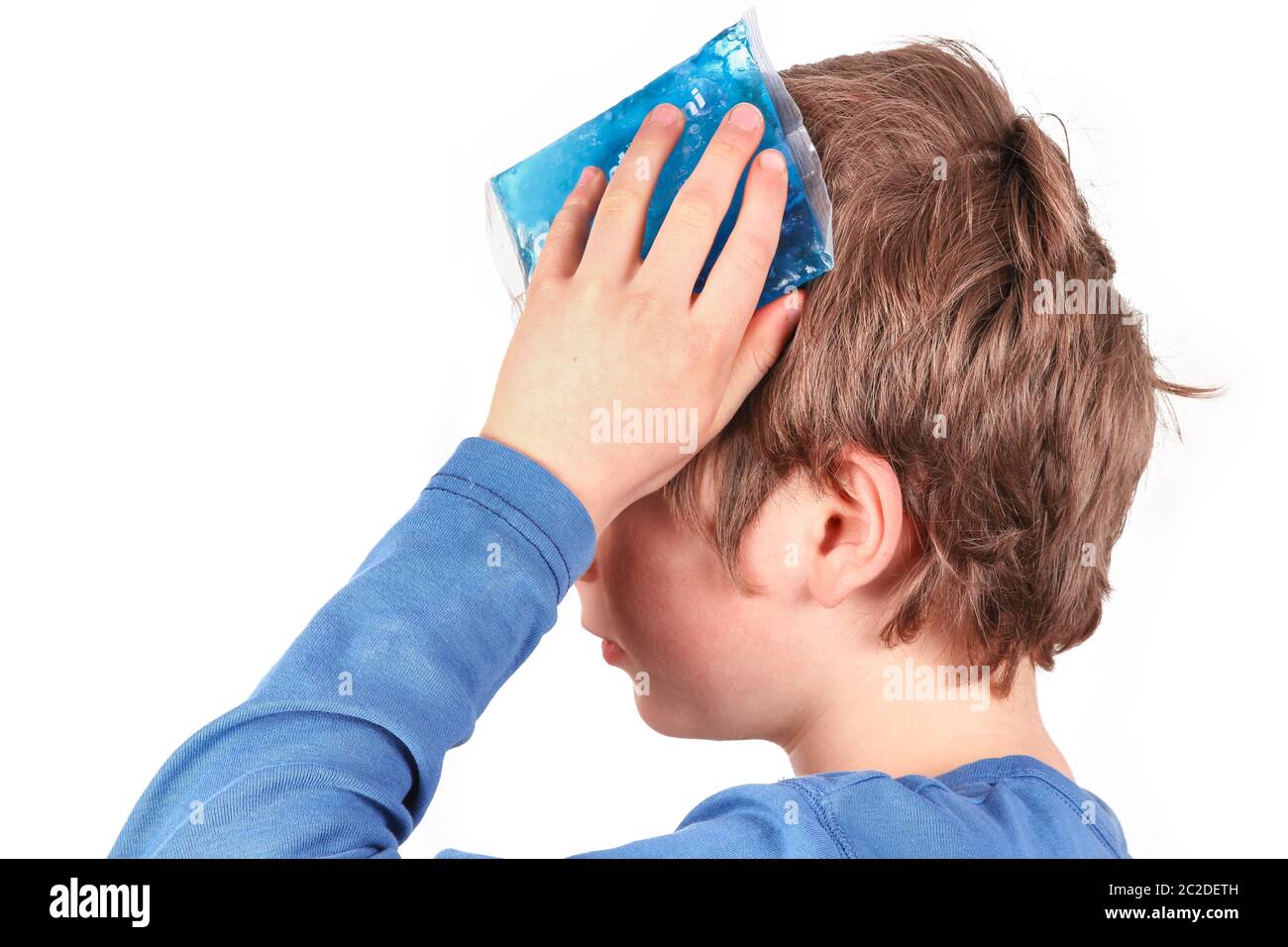 Child cools the forehead with a cold pack Stock Photo - Alamy