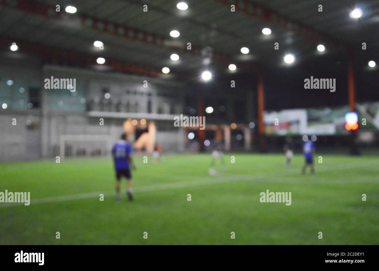 blurry of football player in stadium field Stock Photo - Alamy