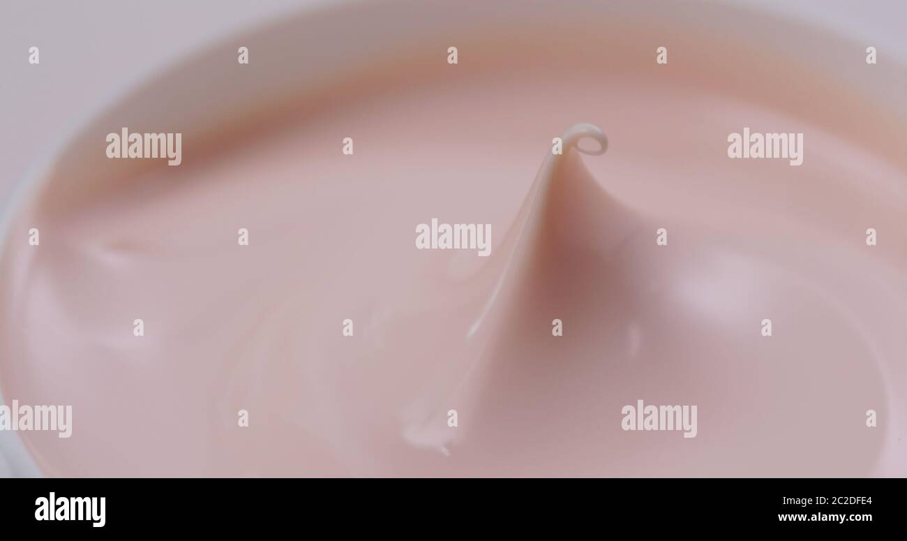 Cosmetics lotion cream in pink colour Stock Photo - Alamy