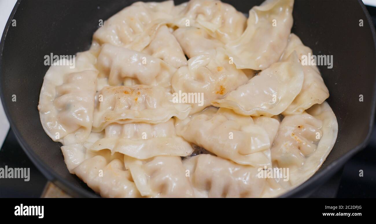 Fry meat dumpling at home Stock Photo - Alamy