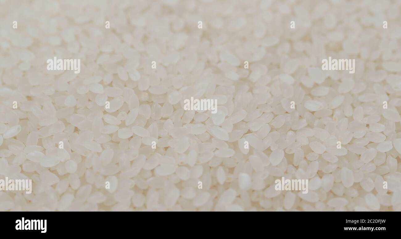 Stack of Rice dried and uncooked Stock Photo - Alamy