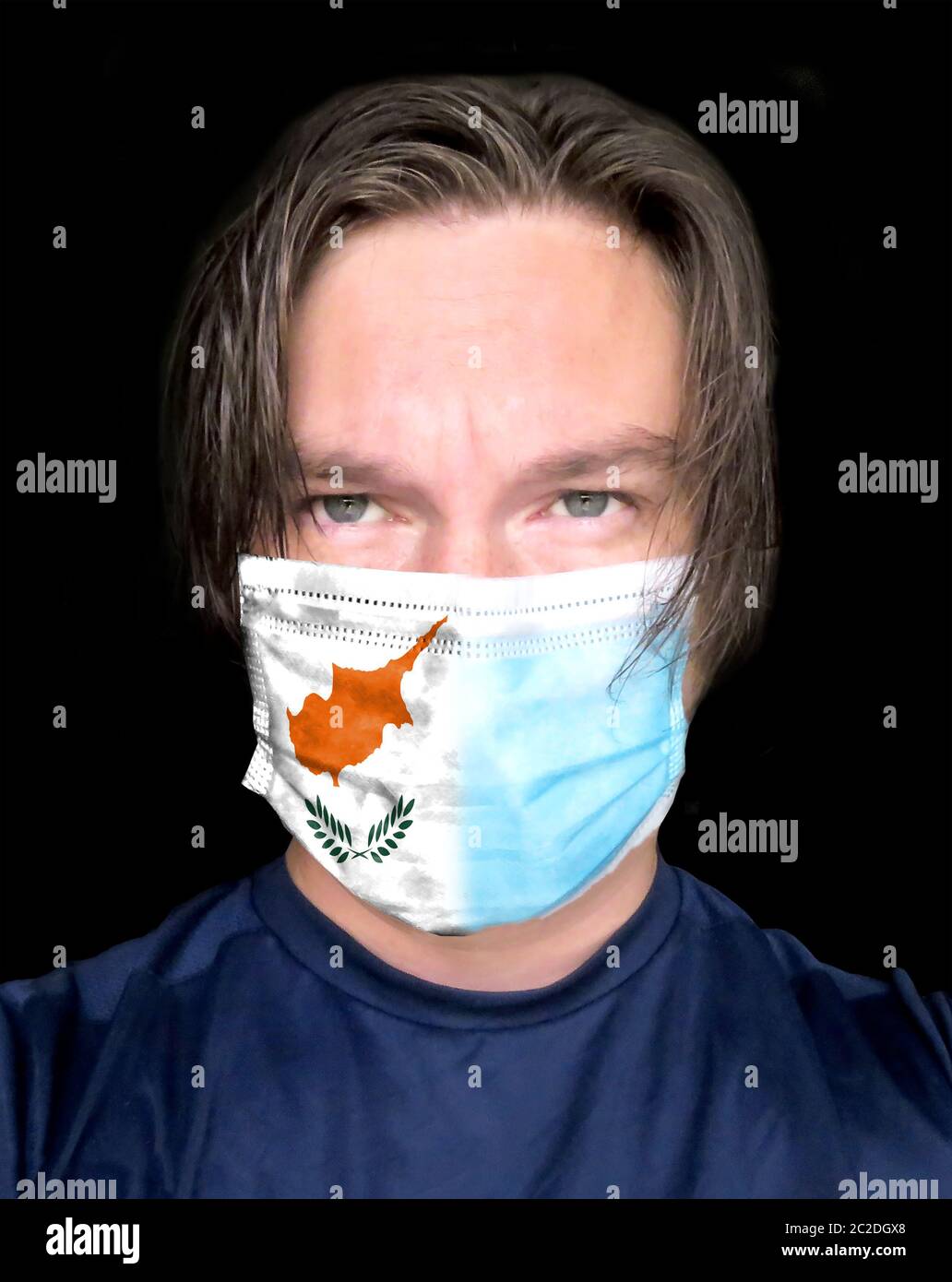 Man in medical mask with Cyprus flag on the mask Stock Photo - Alamy