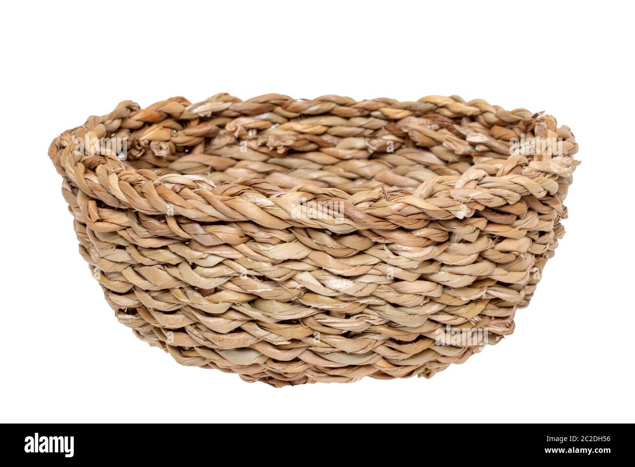 Empty basket. Close-up of a empty straw basket isolated on a white ...